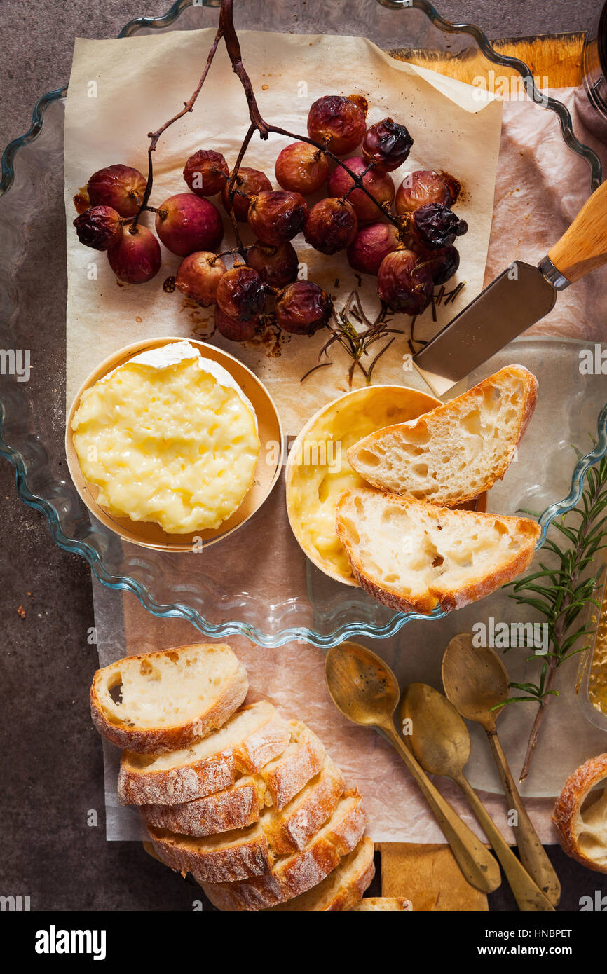 Breakfast with Camembert cheese, grapes and honey. French healthy food ...