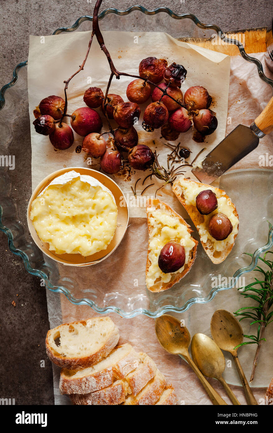 Breakfast with Camembert cheese, grapes and honey. French healthy food ...