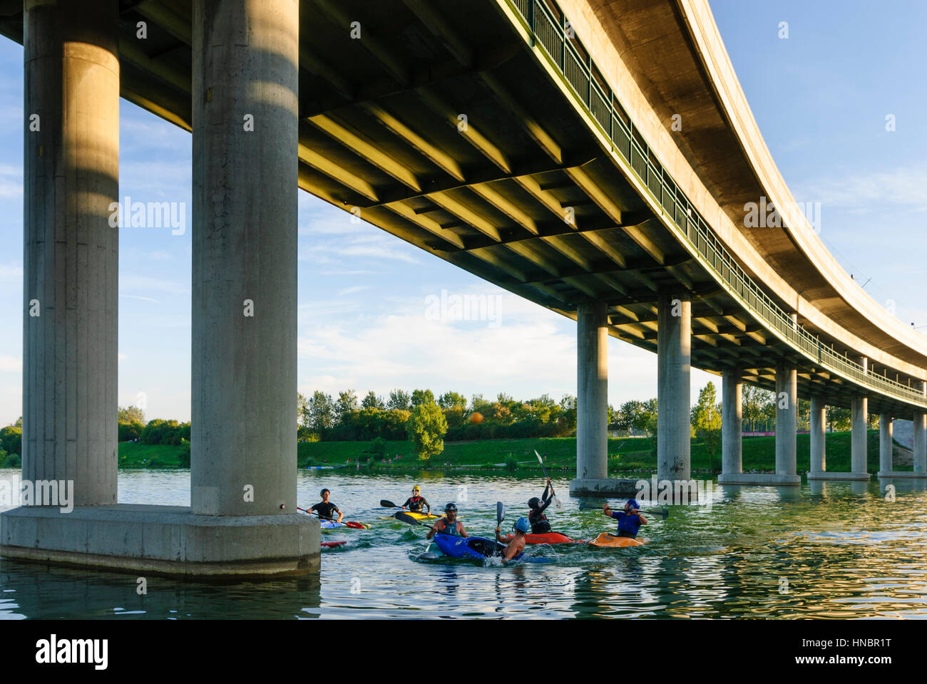 Wien, Vienna, Canoe Polo players on the new Danube under the bridges of ...