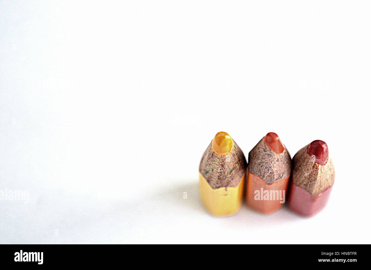 Three small colored pencils Stock Photo - Alamy