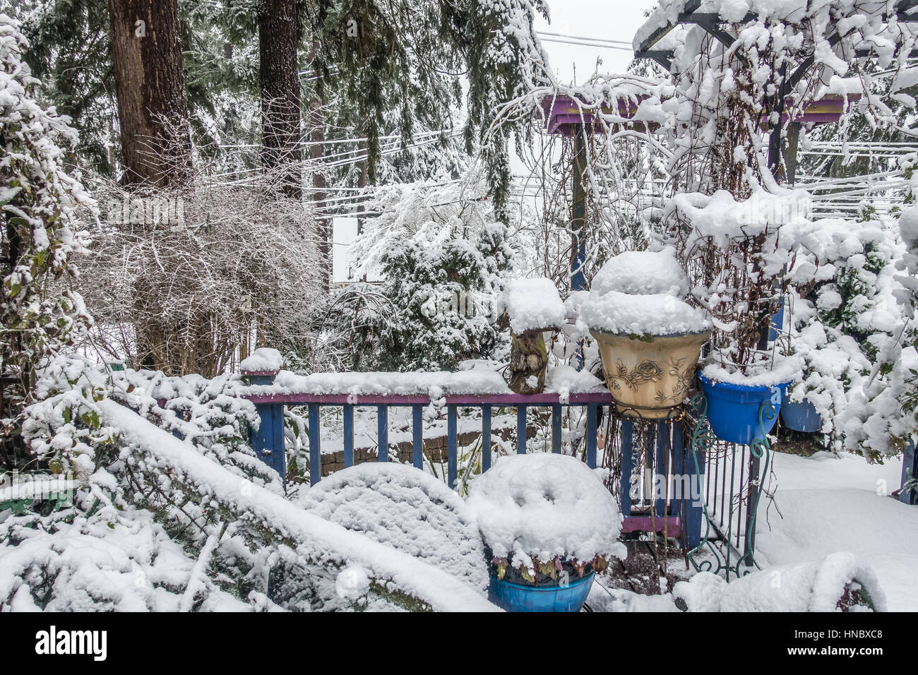 A porch is covered in white fluffy snow after a storm Stock Photo - Alamy