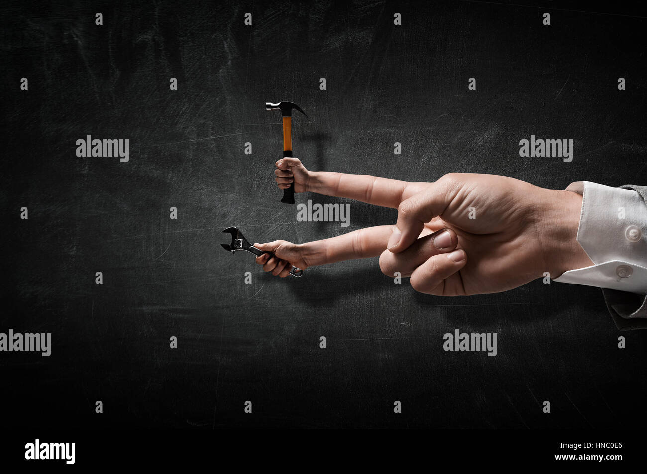 Handyman concept with person hand and adjustable tools Stock Photo - Alamy
