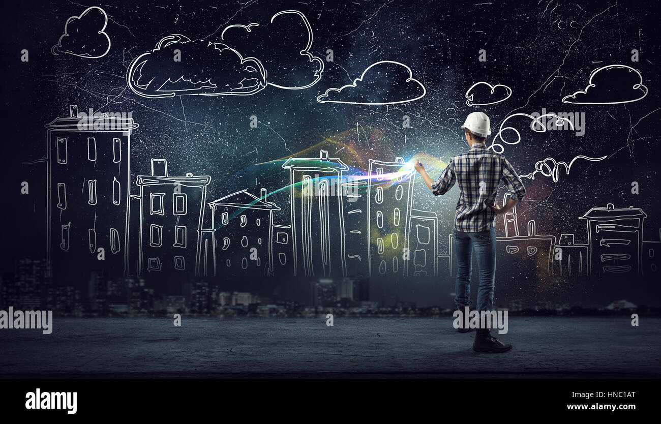 Rear view of engineer woman drawing construction plan Stock Photo - Alamy