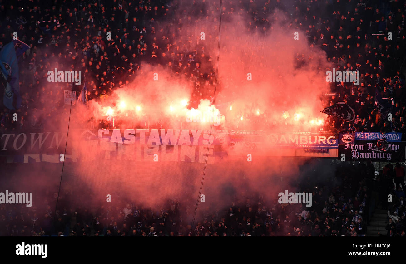 Leipzig, Germany. 11th Feb, 2017. Hamburg's fans light pyrotechnics ...