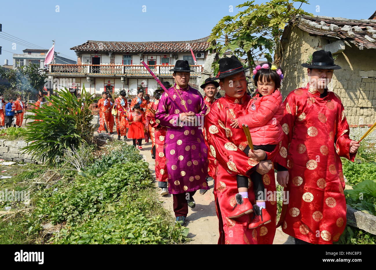 Putian, China's Fujian Province. 11th Feb, 2017. Villagers wearing ...