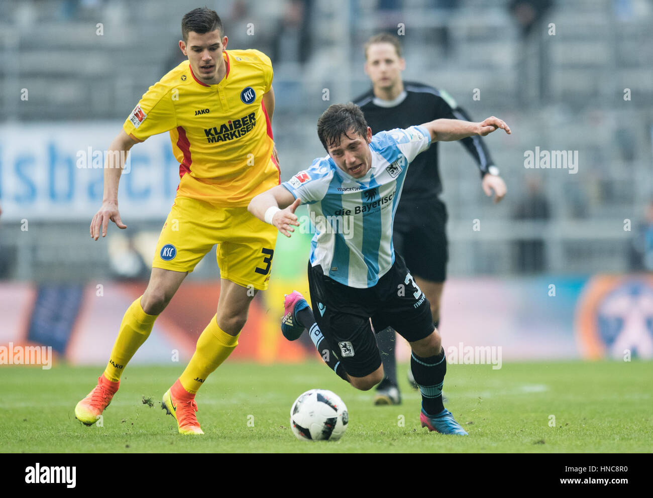 Munich, Germany. 11th Feb, 2017. Karlsruhe's Oskar Zawada (l) and ...