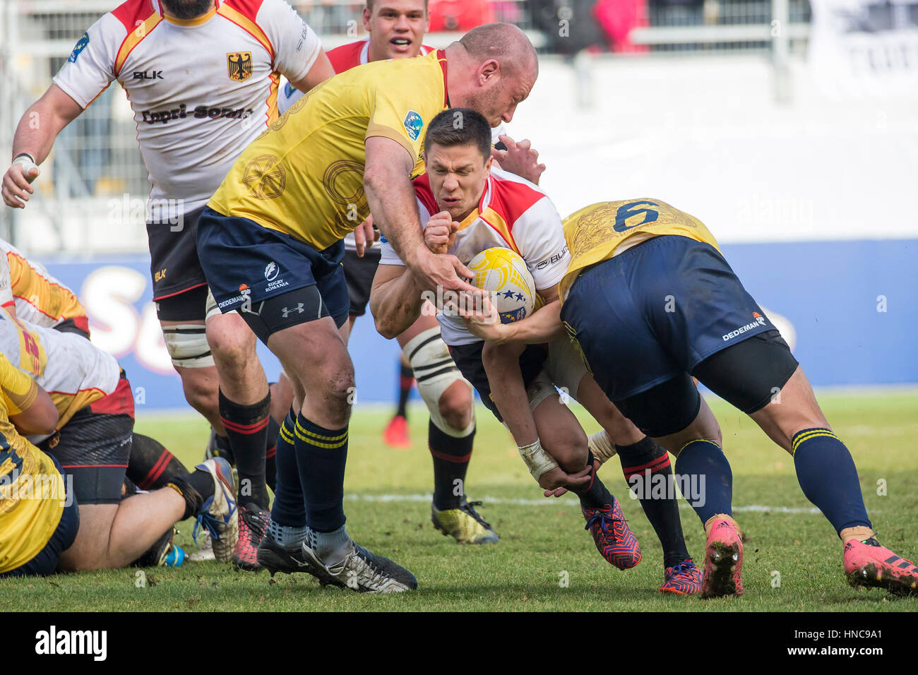 Offenbach, Germany. 11th Feb, 2017. Germany's Tim Menzel is tackled by ...