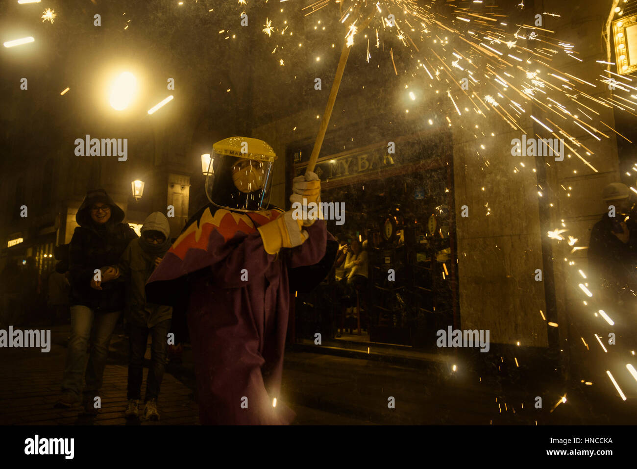 Barcelona, Spain. 11th Feb, 2017. A child in a devil costume dances to ...