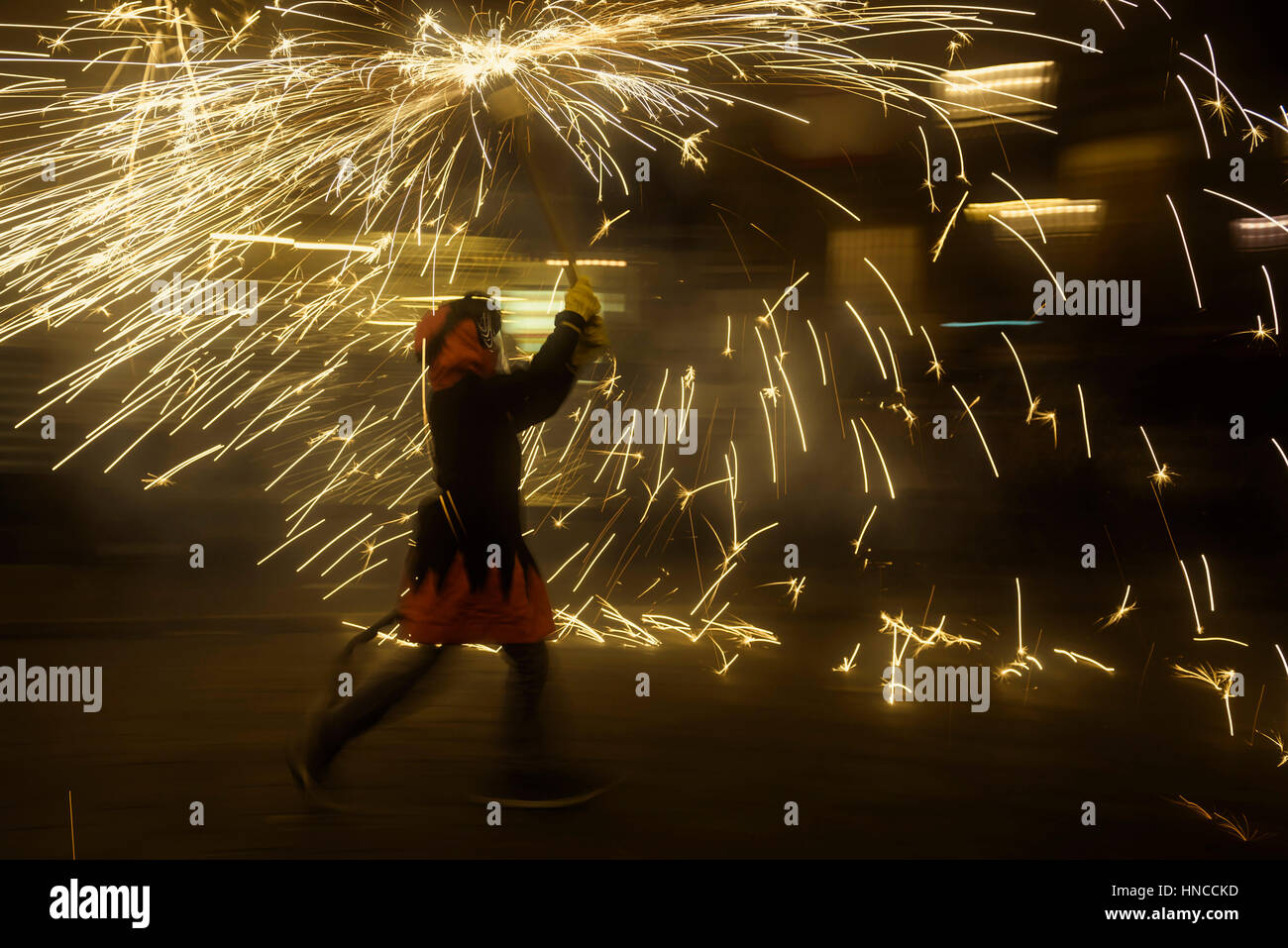 Barcelona, Spain. 11th Feb, 2017. A child in a devil costume dances to ...