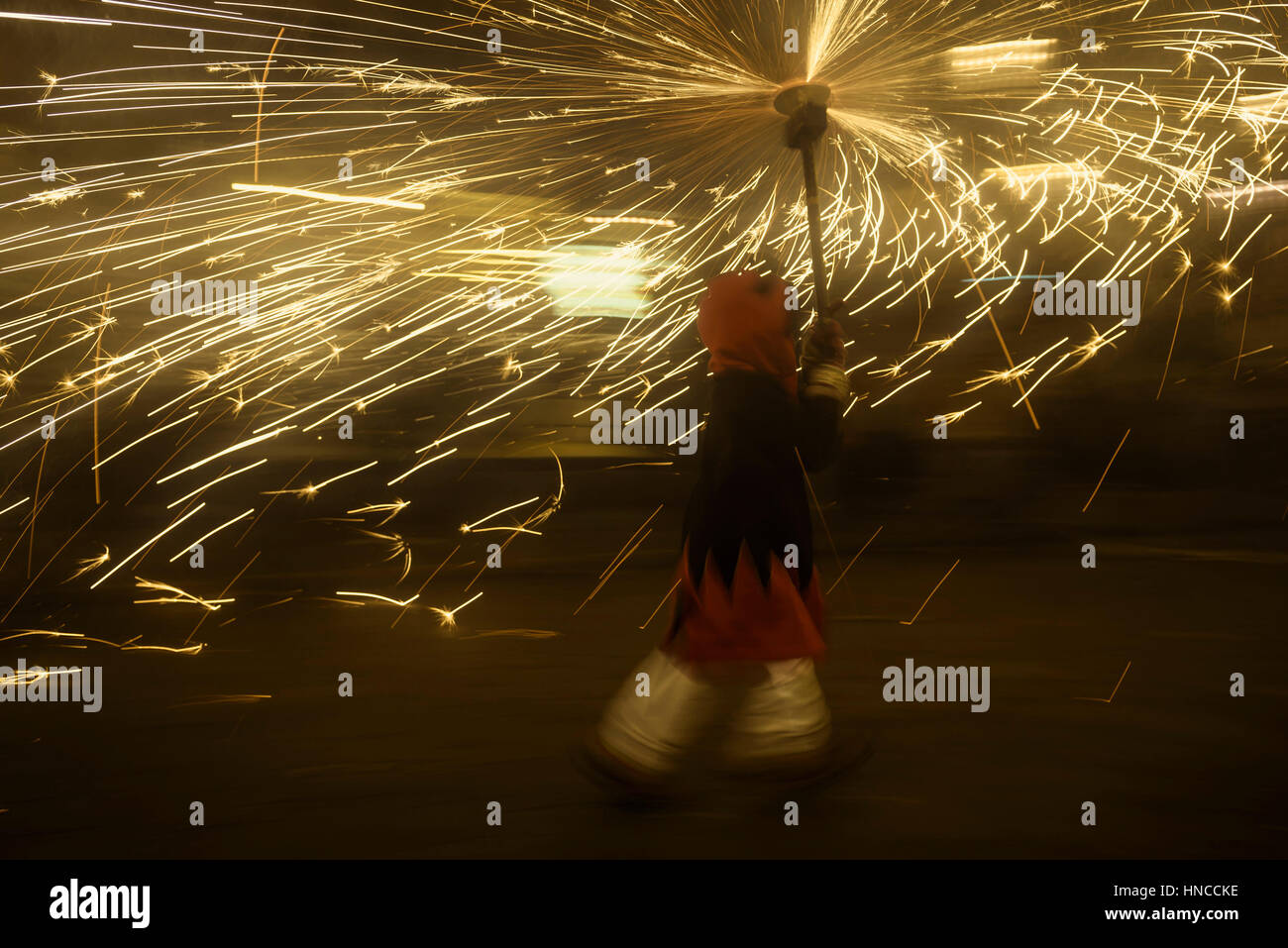 Barcelona, Spain. 11th Feb, 2017. A child in a devil costume dances to ...