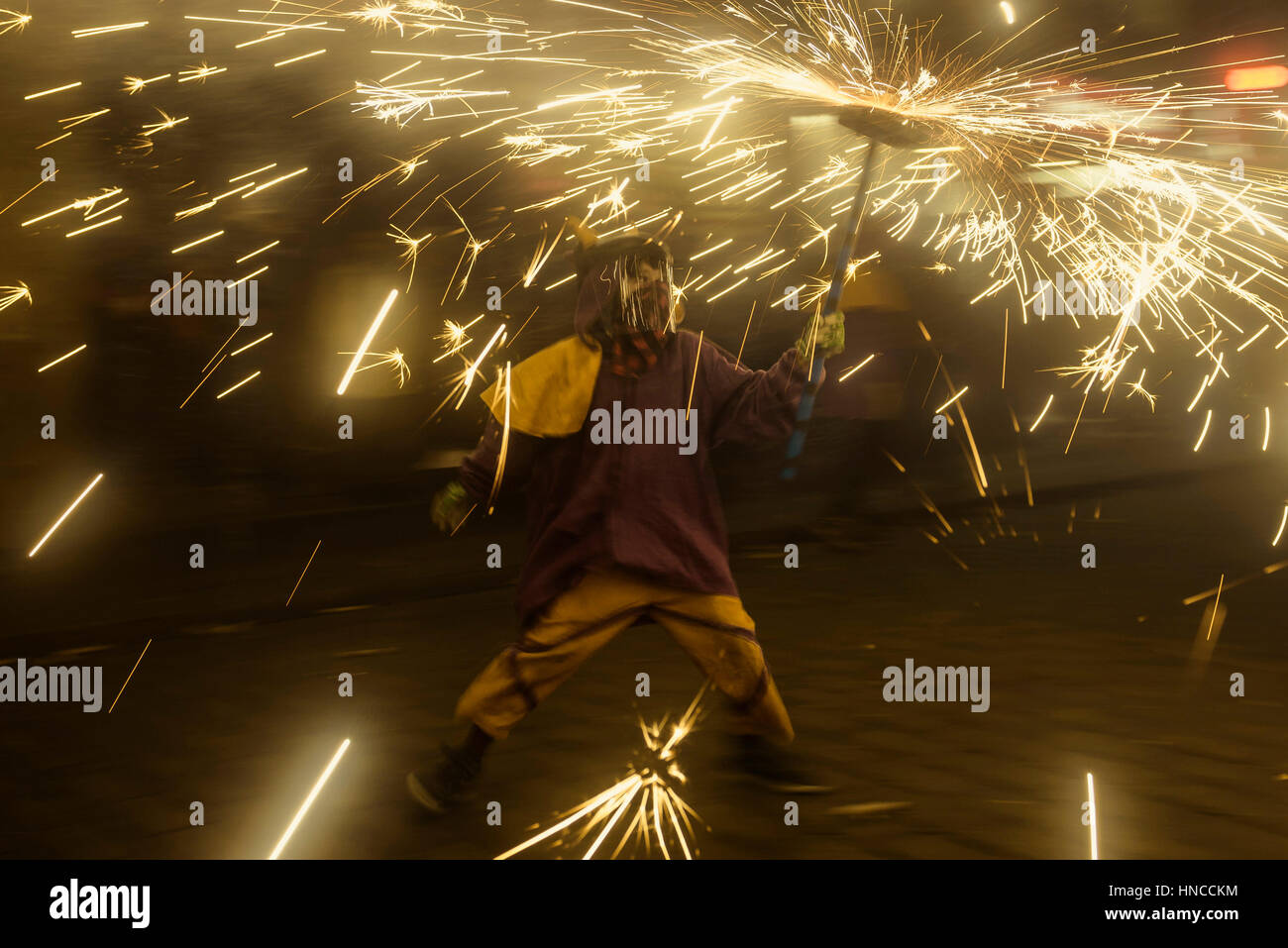 Barcelona, Spain. 11th Feb, 2017. A child in a devil costume dances to ...