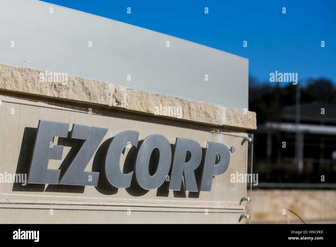 A logo sign outside of the headquarters of EZCORP, Inc., in Austin ...