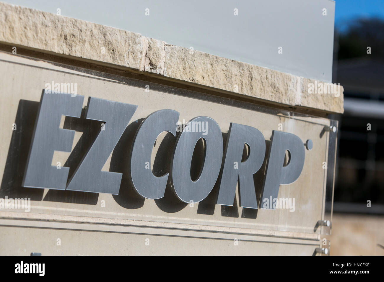 A logo sign outside of the headquarters of EZCORP, Inc., in Austin ...