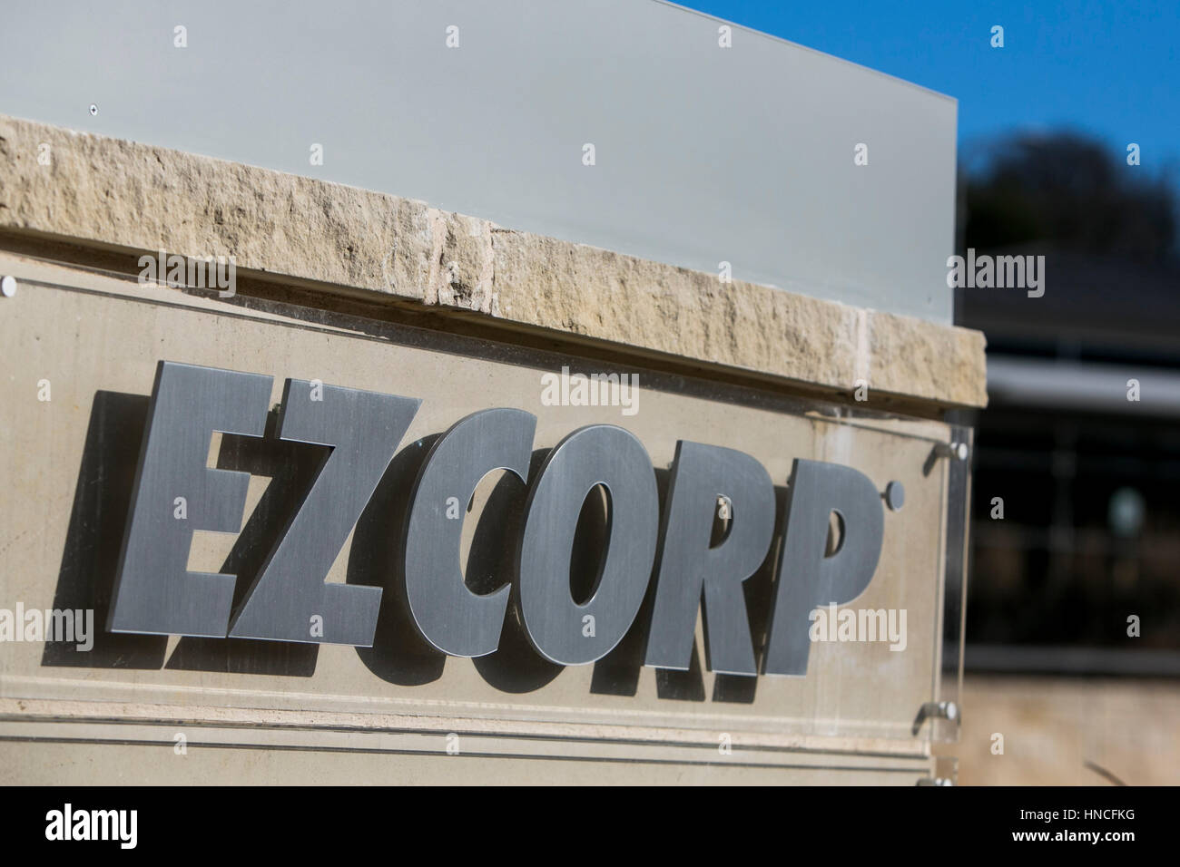 A logo sign outside of the headquarters of EZCORP, Inc., in Austin ...