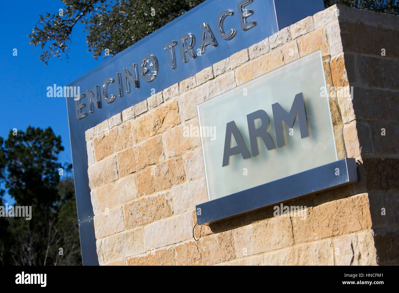 A logo sign outside of a facility occupied by ARM Holdings in Austin ...
