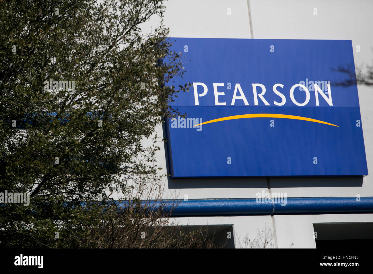 A logo sign outside of a facility occupied by Pearson PLC in Austin ...