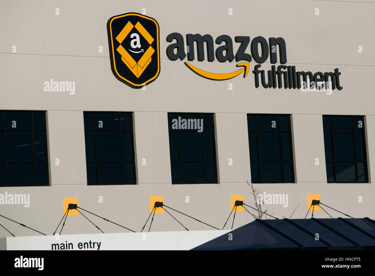 A logo sign outside of a Amazon Fulfillment center in San Marcos, Texas ...