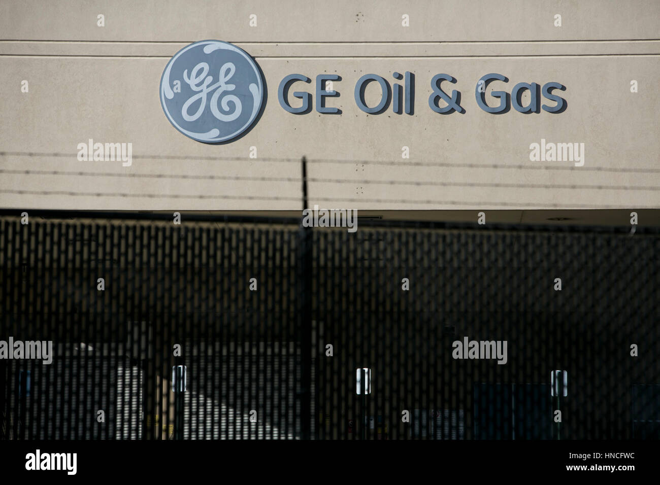 A logo sign outside of a facility occupied by GE Oil & Gas in Schertz ...