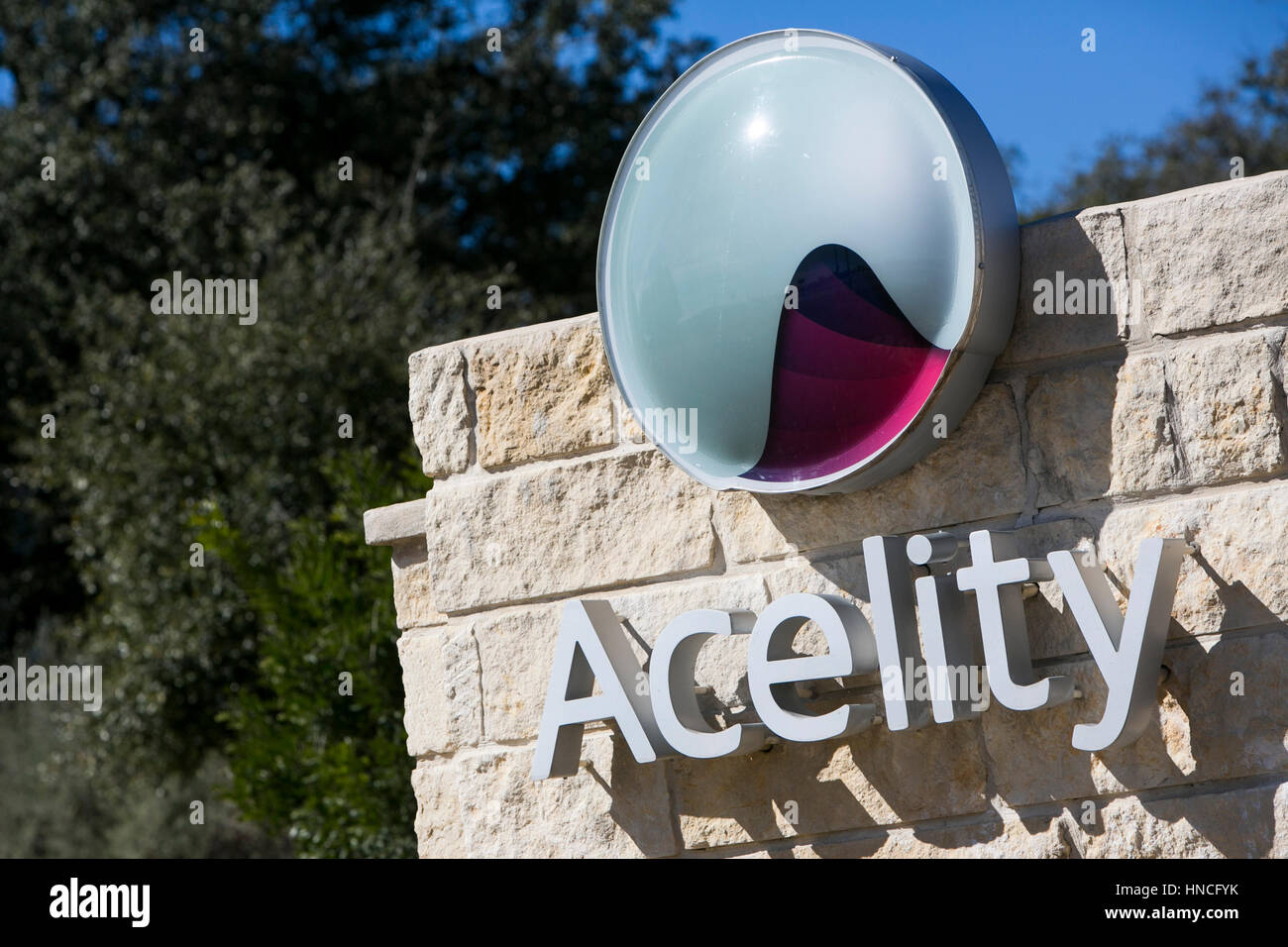 A logo sign outside of the headquarters of Acelity Holdings, Inc., in ...