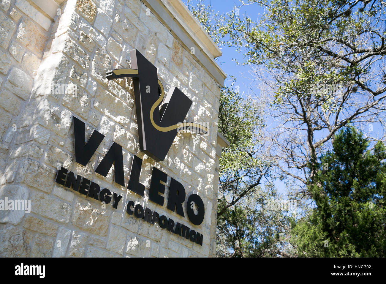 A logo sign outside of the headquarters of the Valero Energy ...