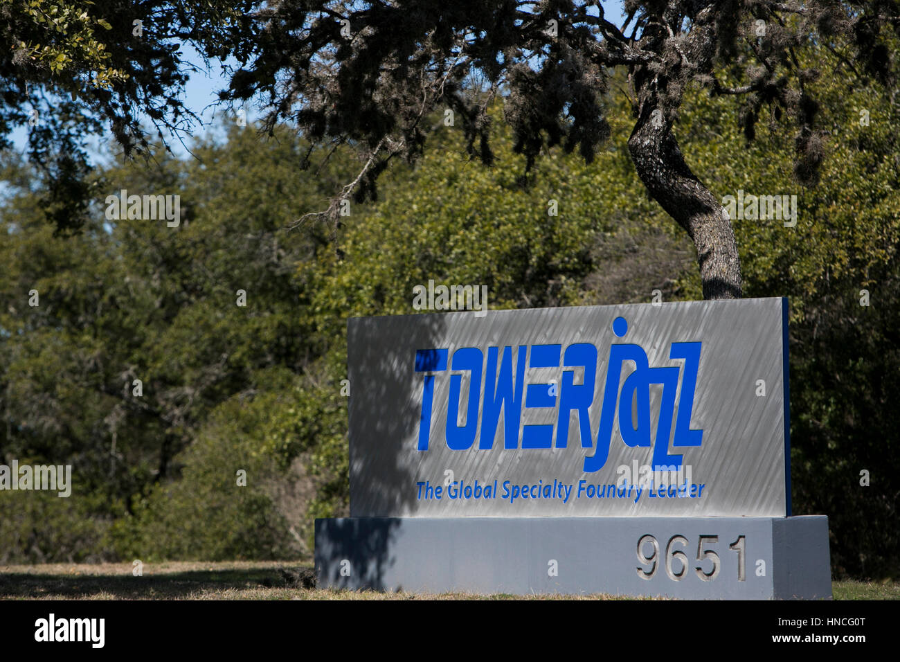 A logo sign outside of a facility occupied by TowerJazz in San Antonio ...