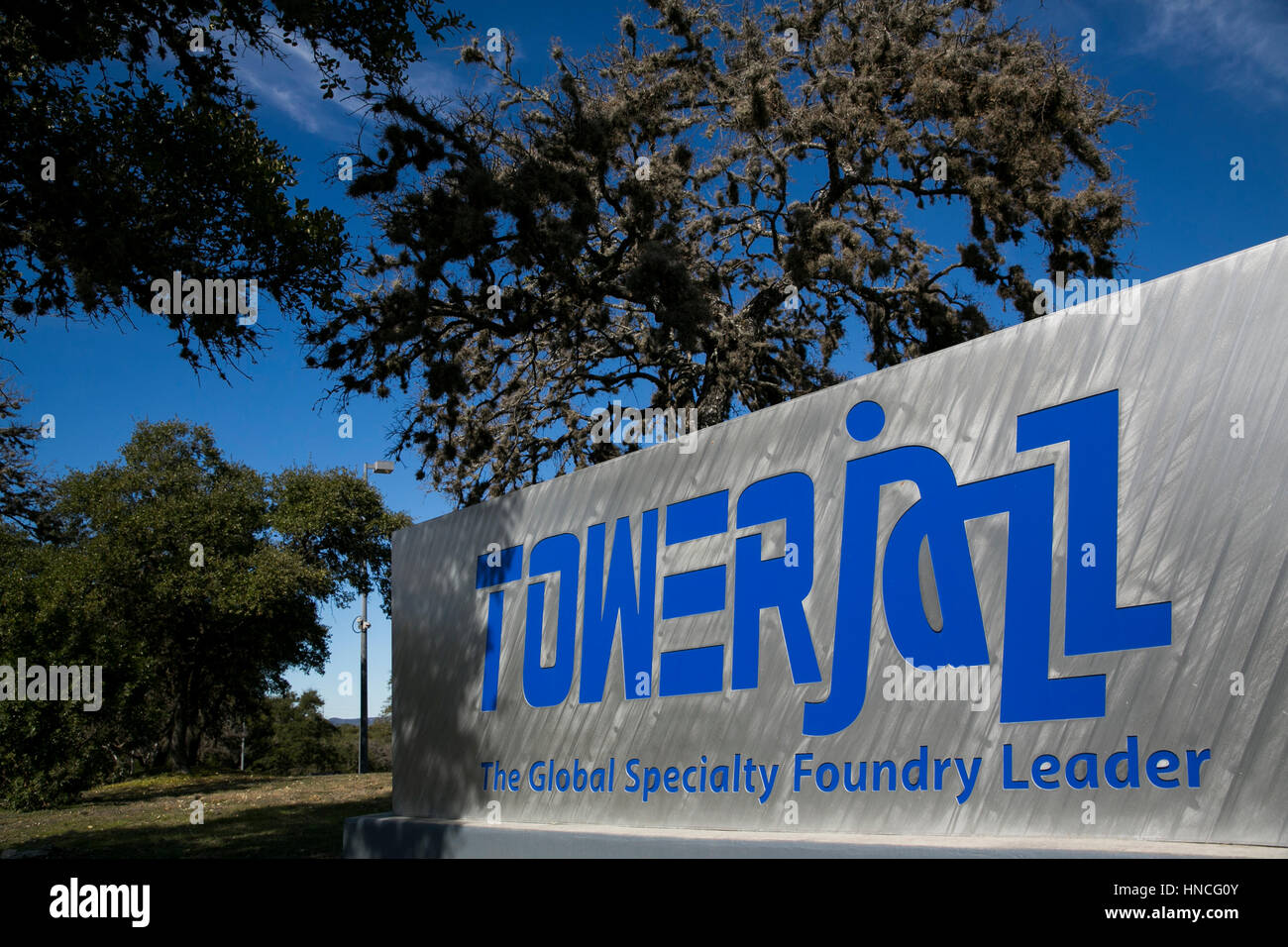 A logo sign outside of a facility occupied by TowerJazz in San Antonio ...