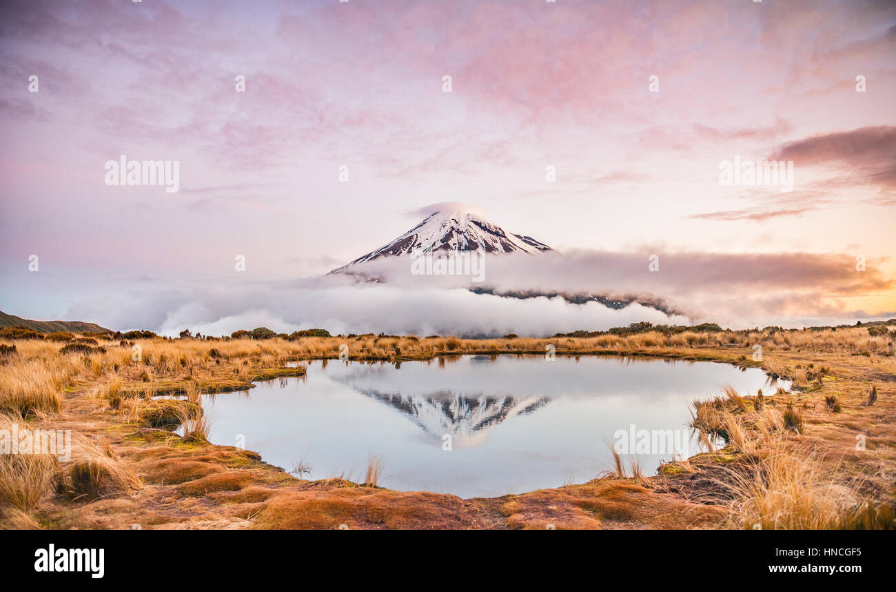 Reflection in Pouakai Tarn, stratovolcano Mount Taranaki or Mount ...