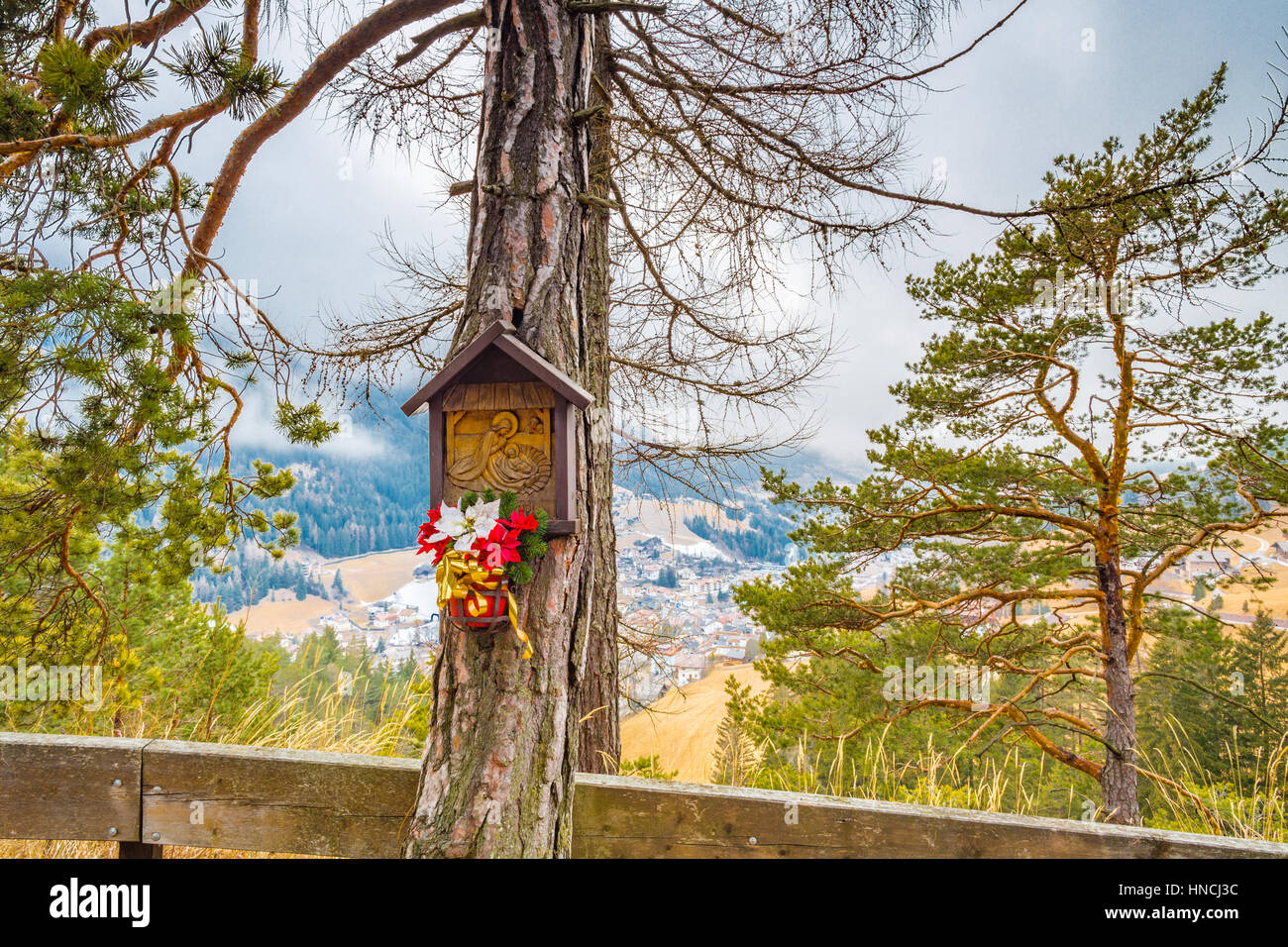 Nativity scene overlooking mountain village in alpine valley in Italy ...