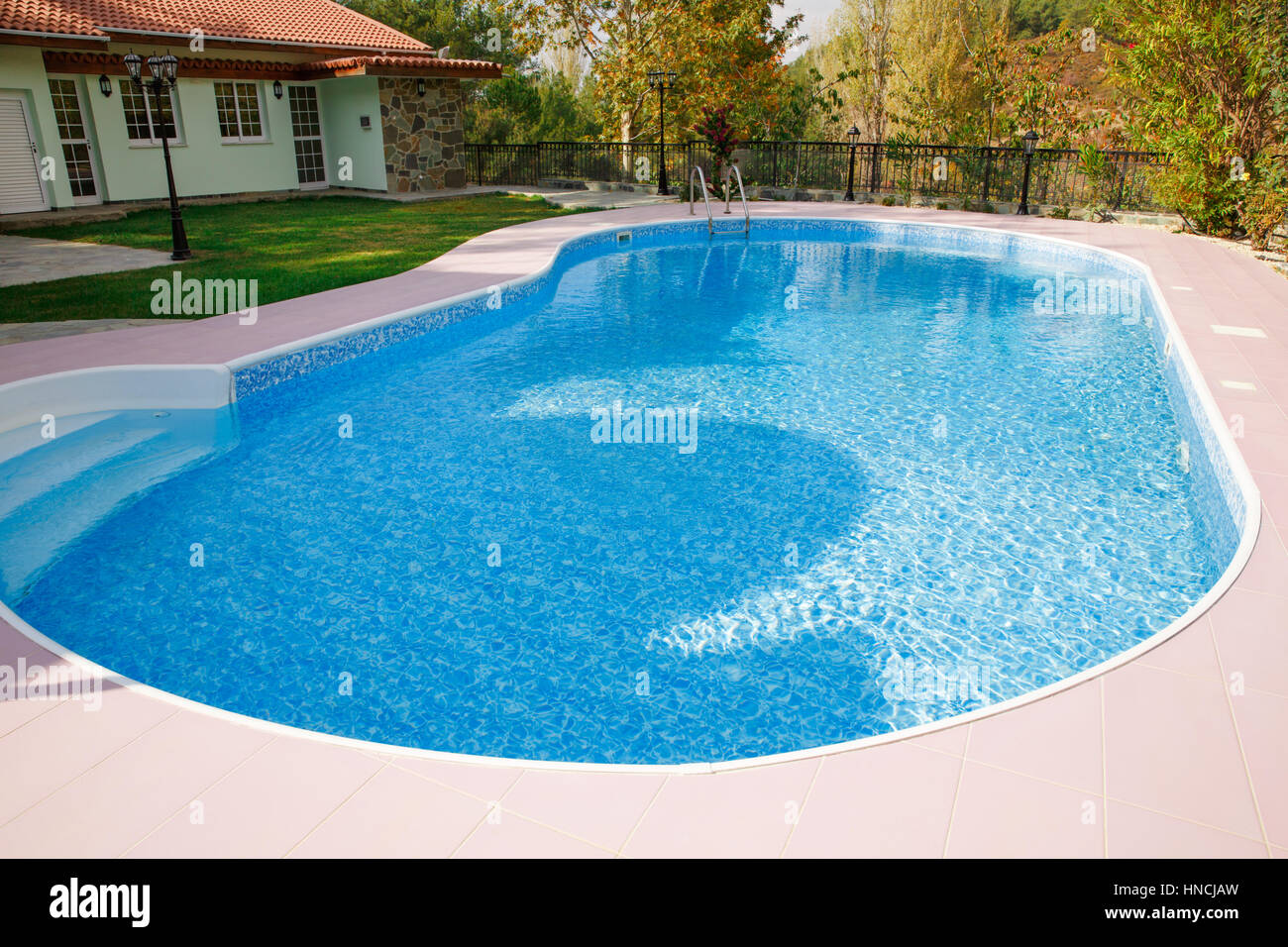Swimming pool at holiday villa in Cyprus Stock Photo - Alamy