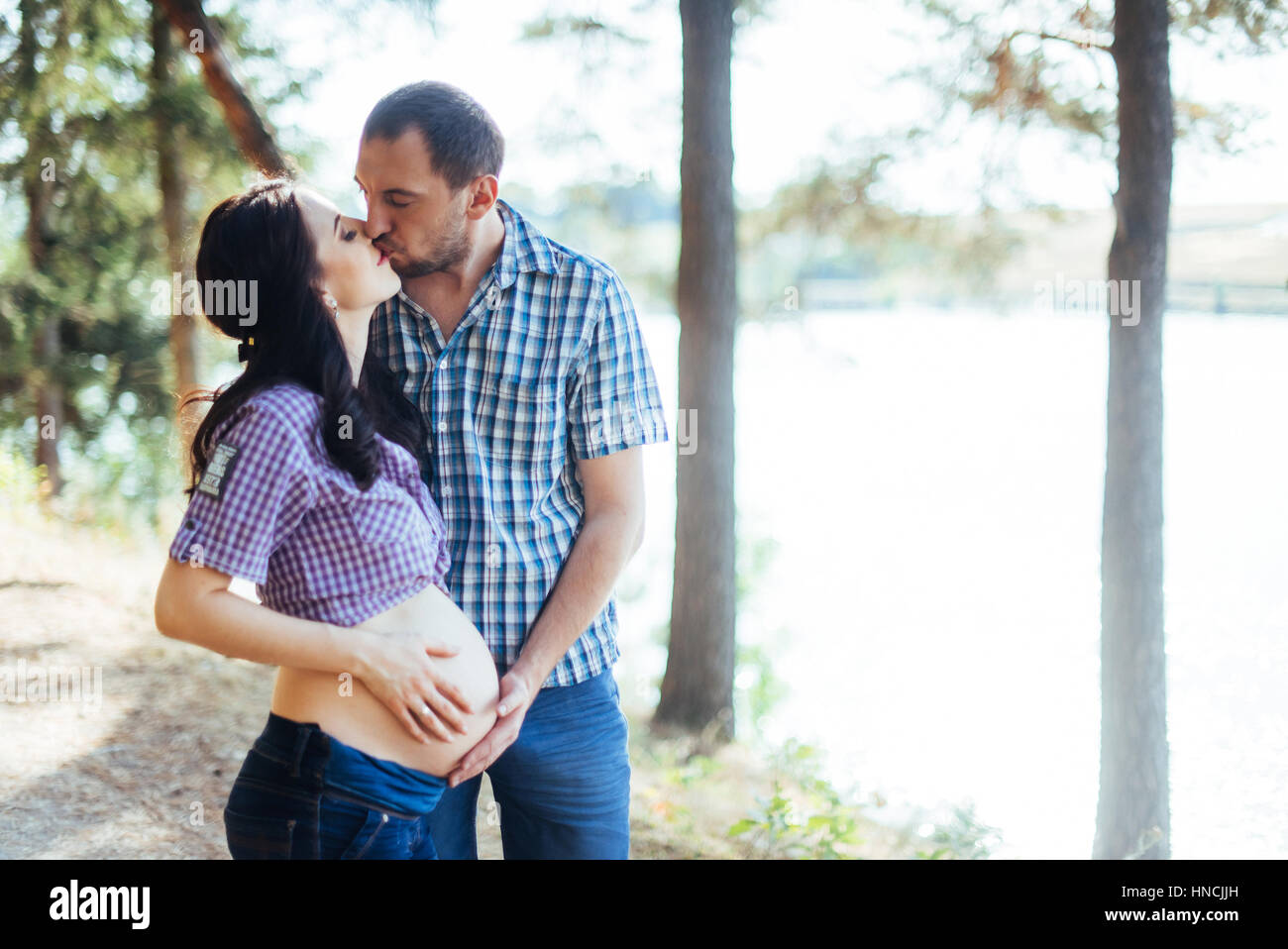 Happy family is waiting their baby Stock Photo - Alamy