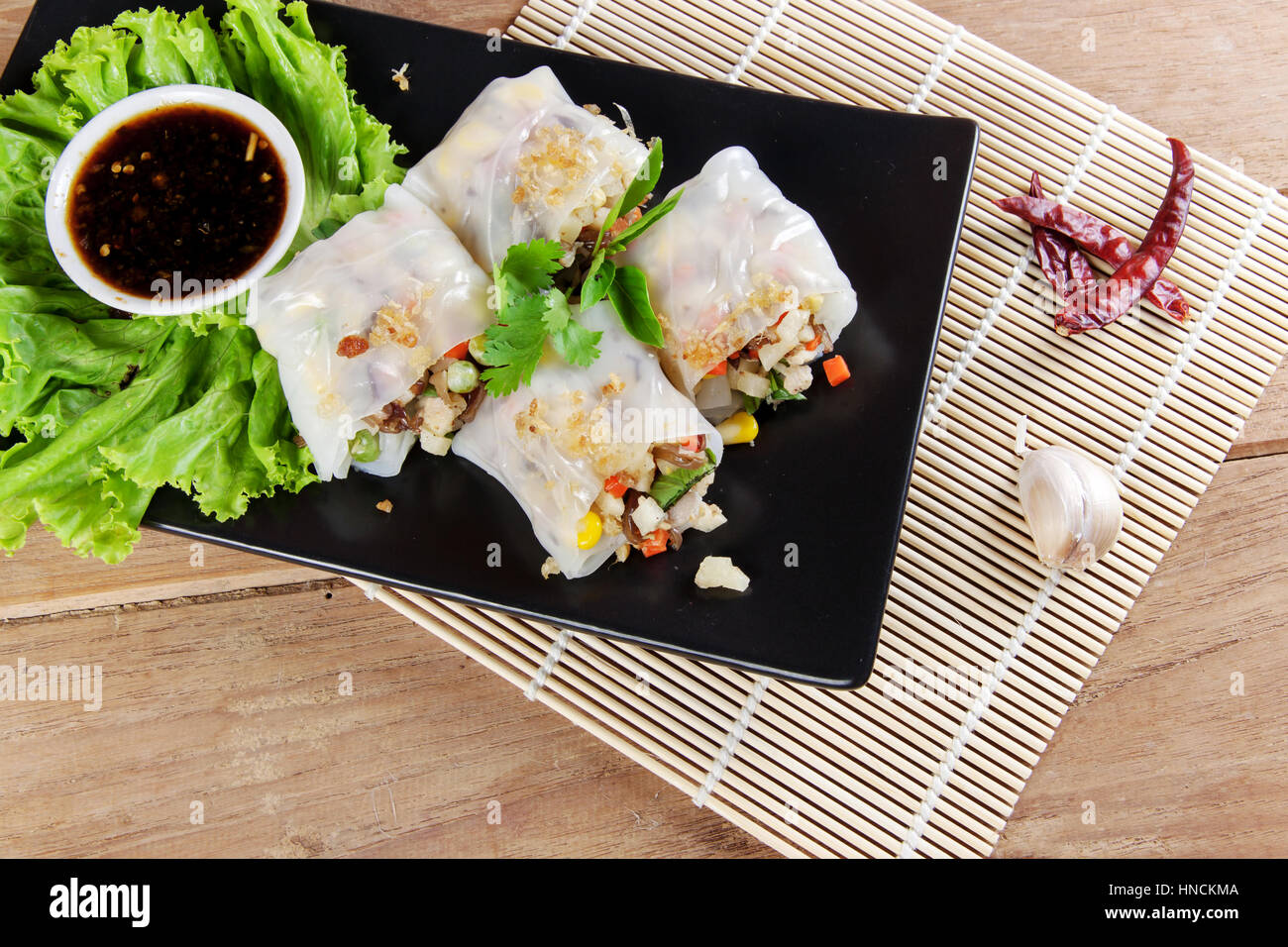 Noodle tube is appetizer menu Asia. made from noodle stuffed with pork ...