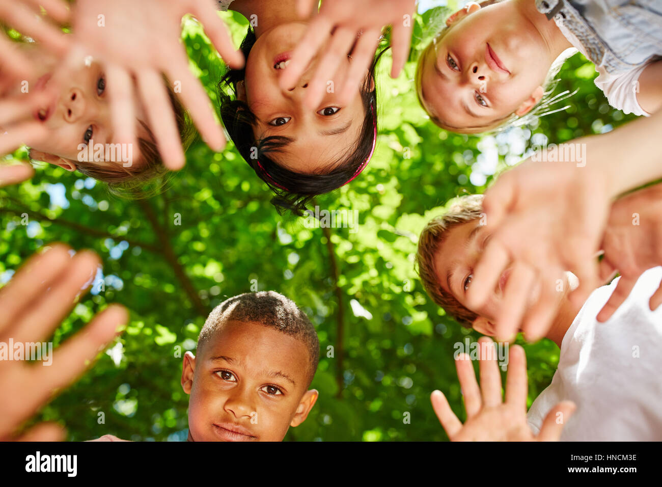 Children support each other as team in a circle for motivation Stock ...