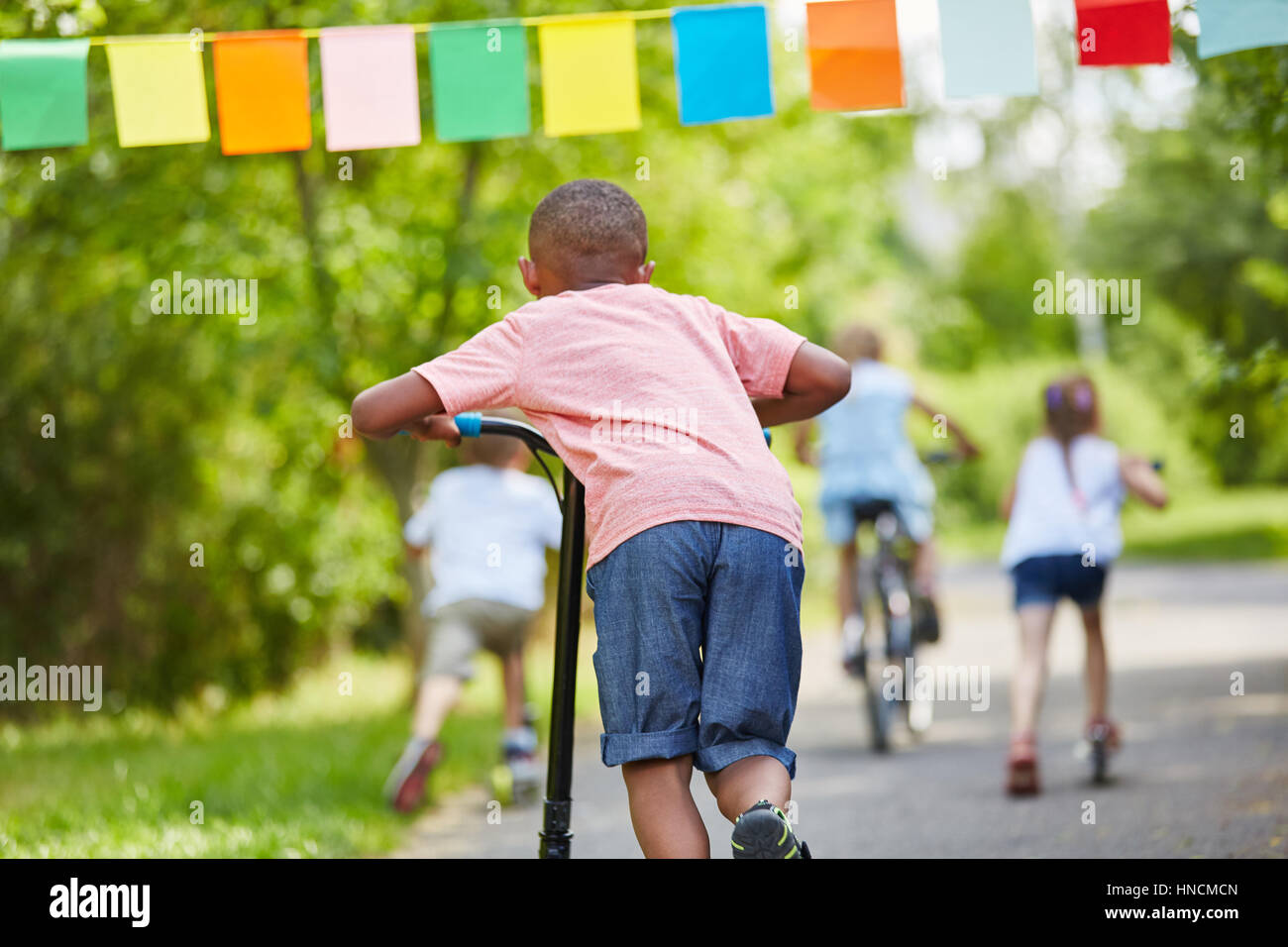 Kids scooters hi-res stock photography and images - Alamy