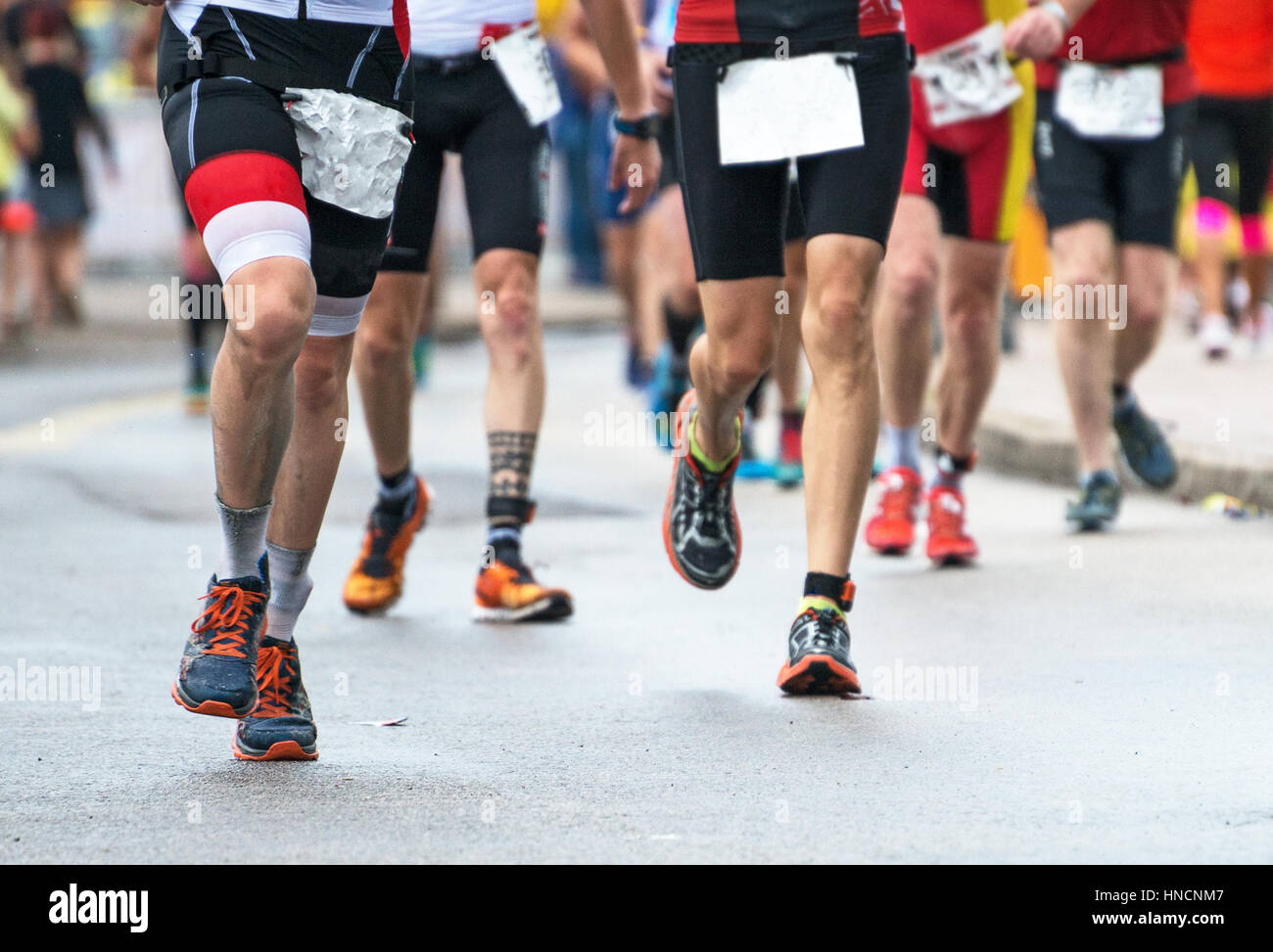 Group of marathon runners on the street Stock Photo - Alamy