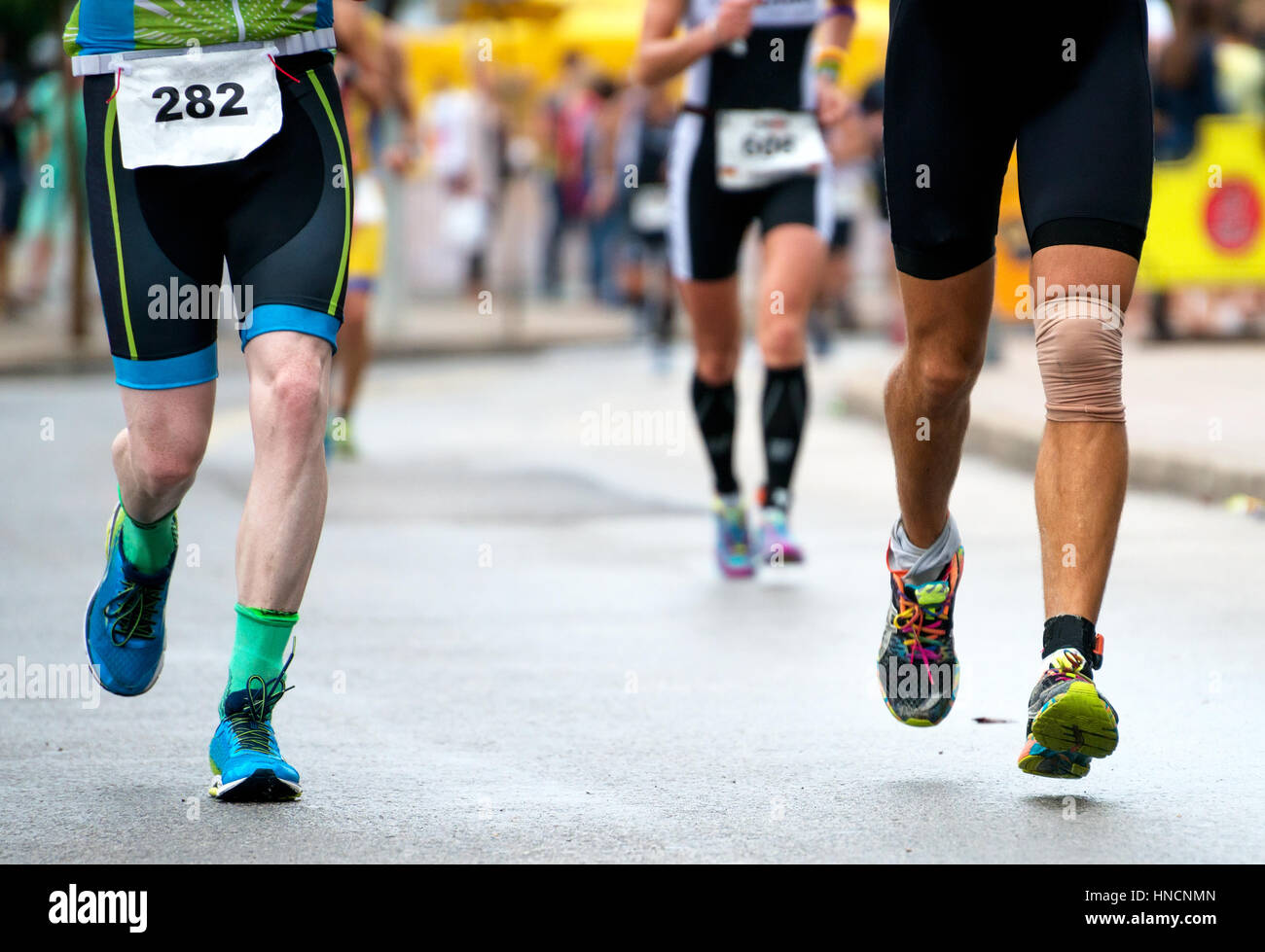 Group of marathon runners on the street Stock Photo - Alamy