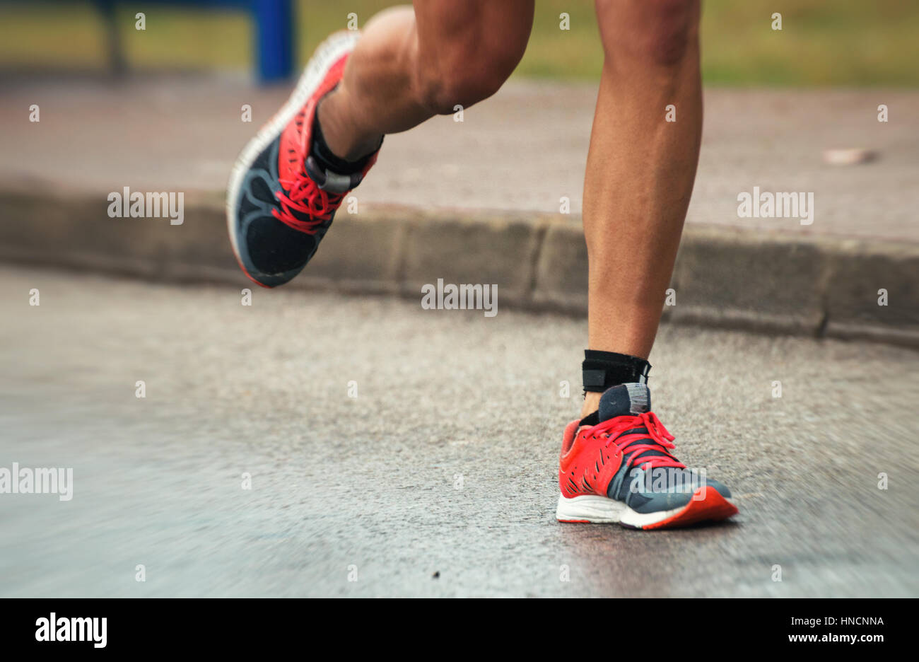 Male athlete running on the street Stock Photo - Alamy