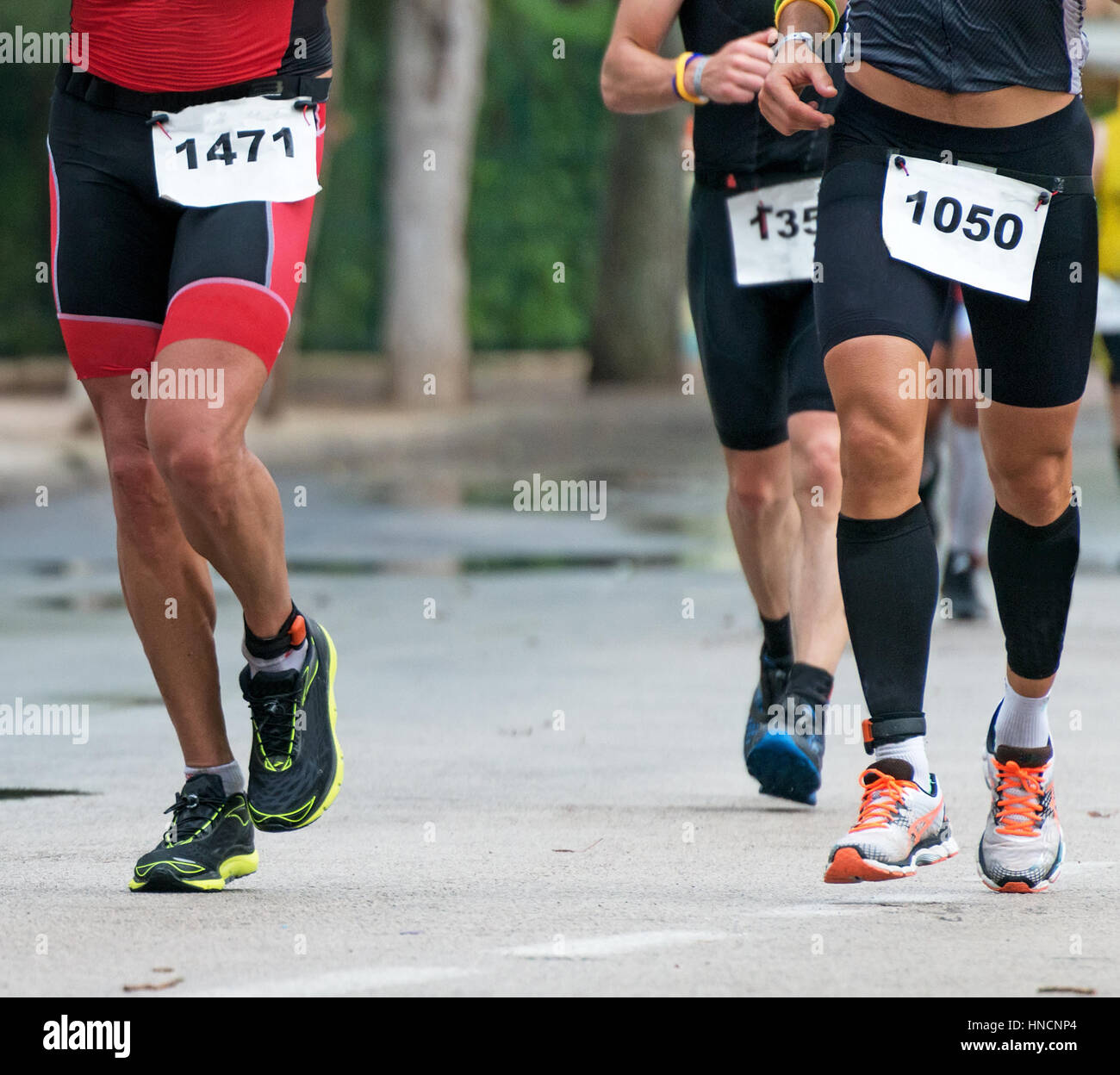 Group of marathon runners on the street Stock Photo - Alamy