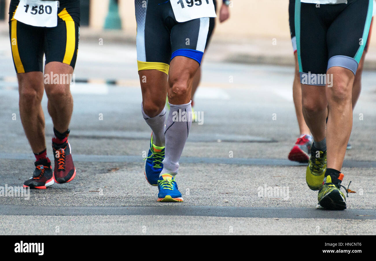 Group of marathon runners on the street Stock Photo - Alamy