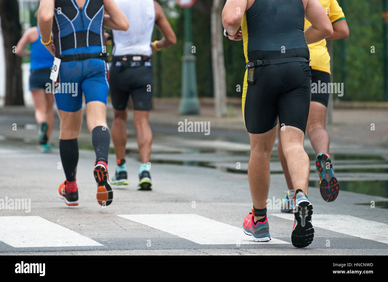 Group of marathon runners on the street Stock Photo - Alamy