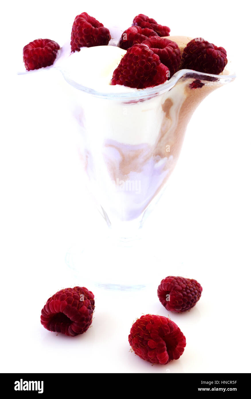Ice cream with raspberries isolated on white background closeup Stock ...