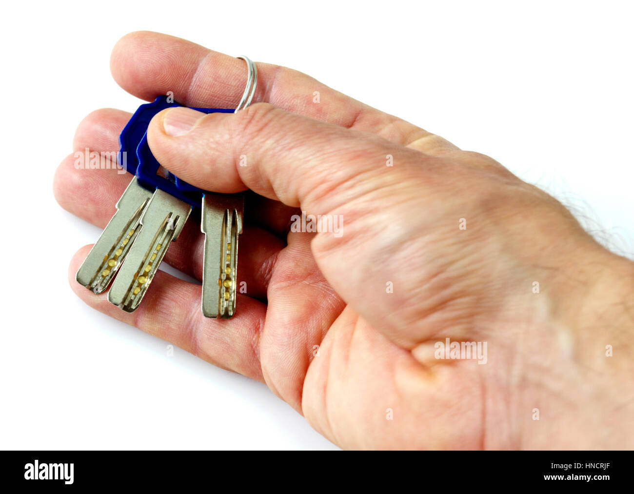 Keys in hand closeup Stock Photo - Alamy
