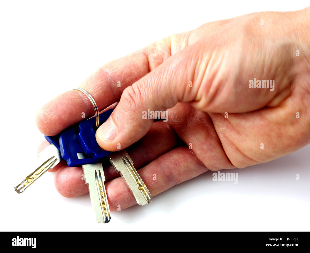 Keys in hand closeup Stock Photo - Alamy