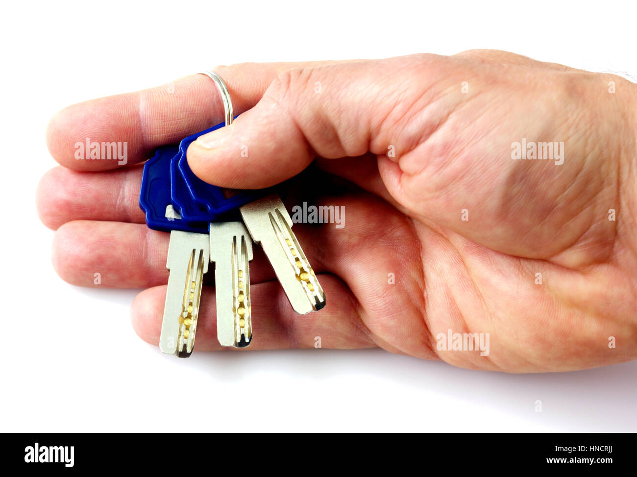 Keys in hand closeup Stock Photo - Alamy