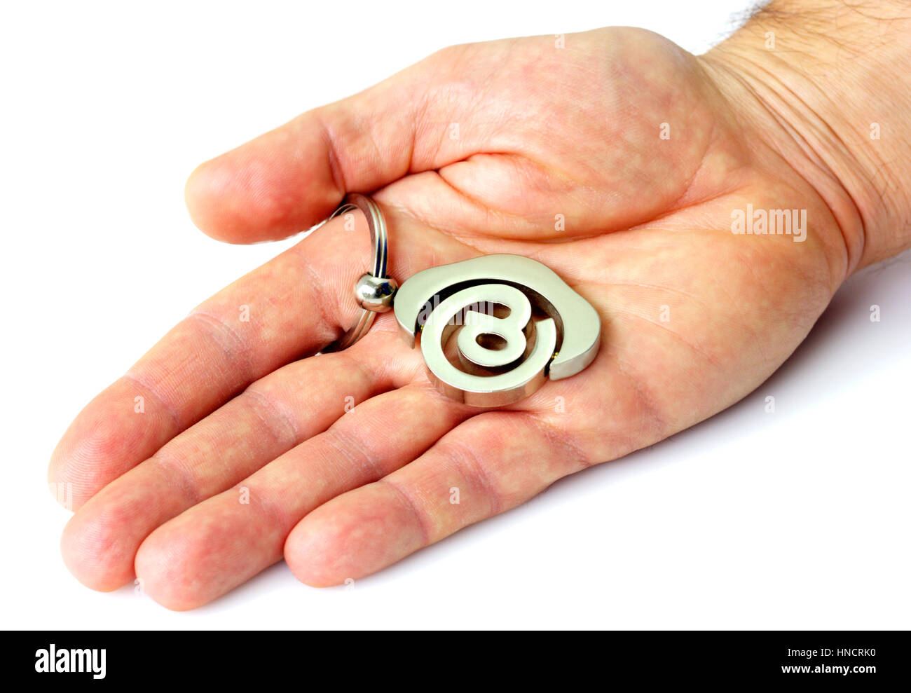 Email symbol in hand closeup Stock Photo - Alamy