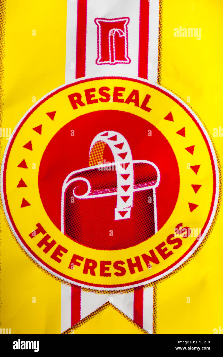 Reseal the freshness sticker on packet of Walkers United Ready Salted ...