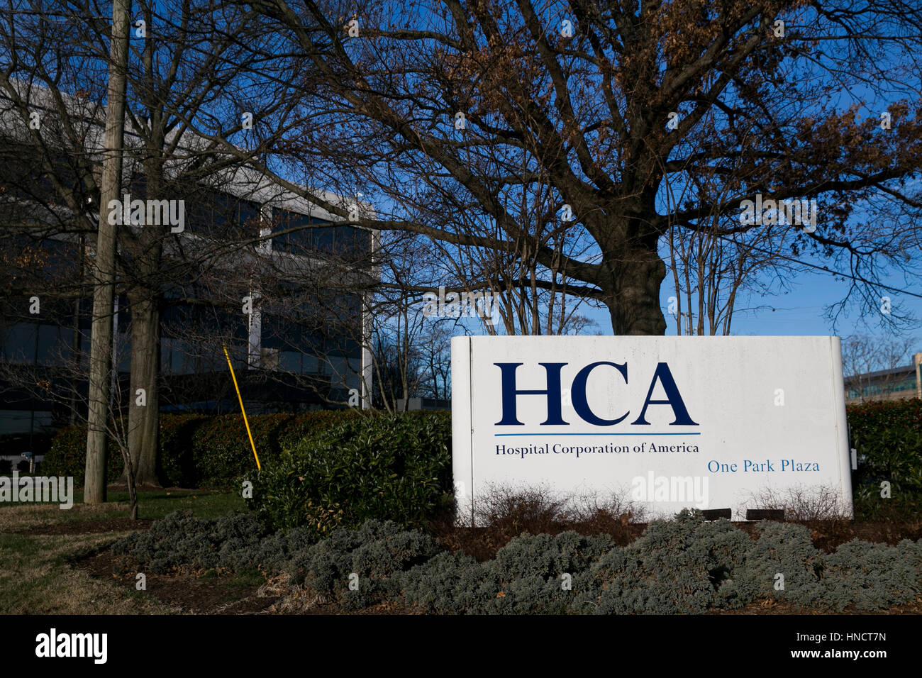 A logo sign outside of the headquarters of the Hospital Corporation of ...