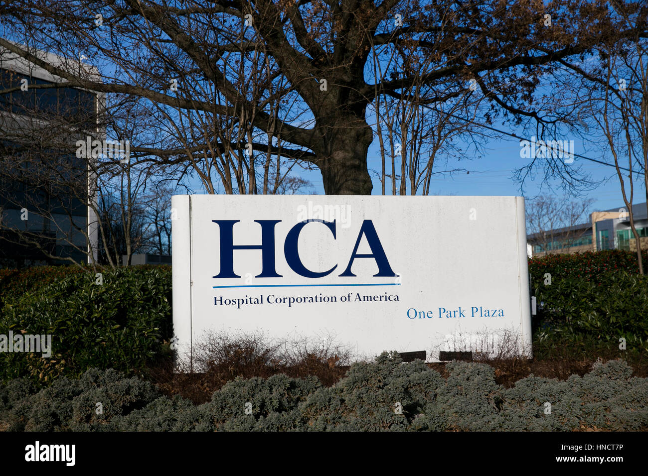 A logo sign outside of the headquarters of the Hospital Corporation of ...
