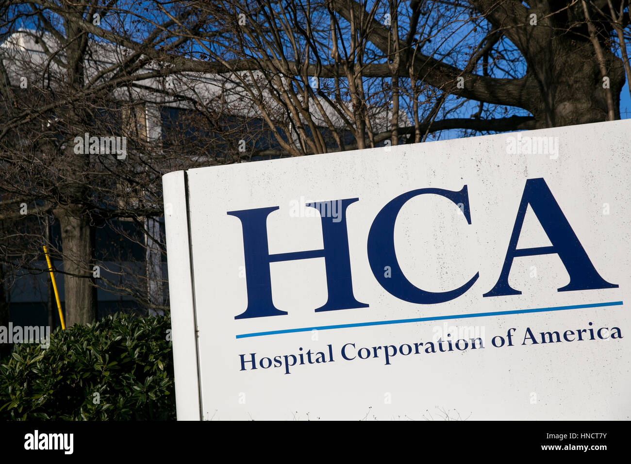 A logo sign outside of the headquarters of the Hospital Corporation of ...