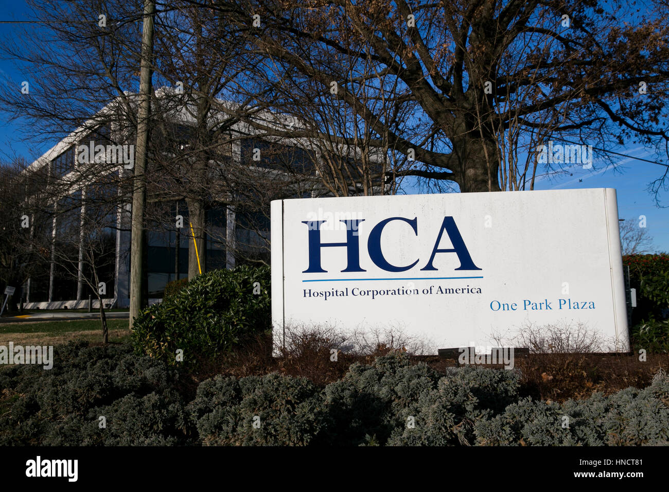 A logo sign outside of the headquarters of the Hospital Corporation of ...