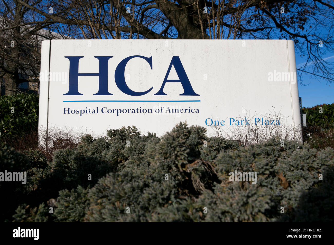 A logo sign outside of the headquarters of the Hospital Corporation of ...